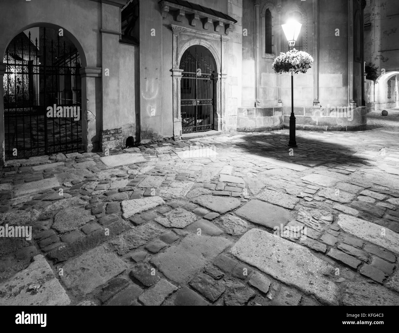 An old medieval style courtyard at night, Lviv, Ukraine Stock Photo - Alamy