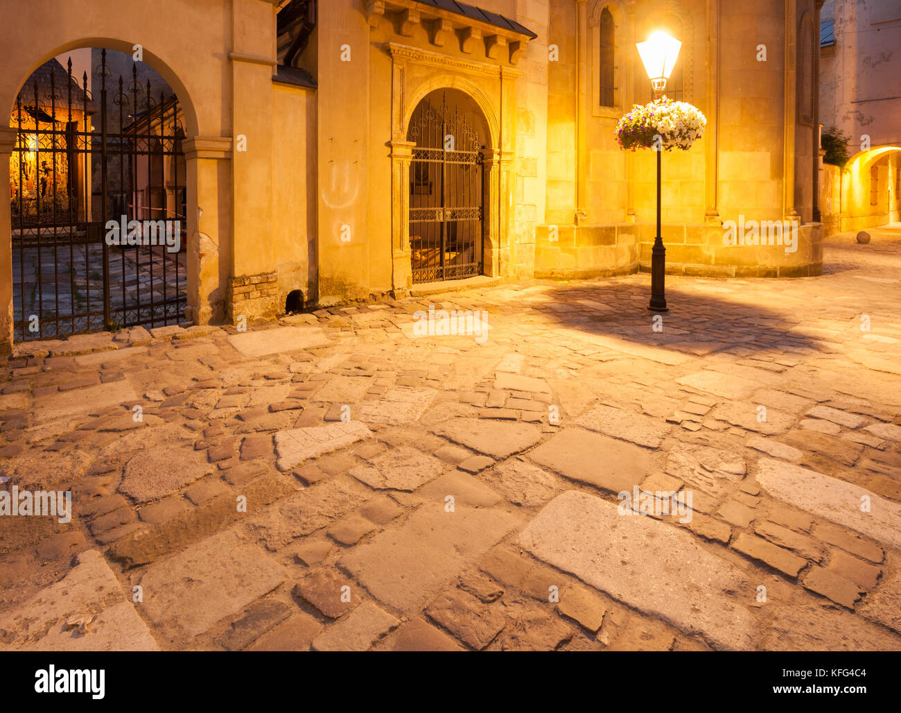 An old medieval style courtyard at night, Lviv, Ukraine Stock Photo - Alamy
