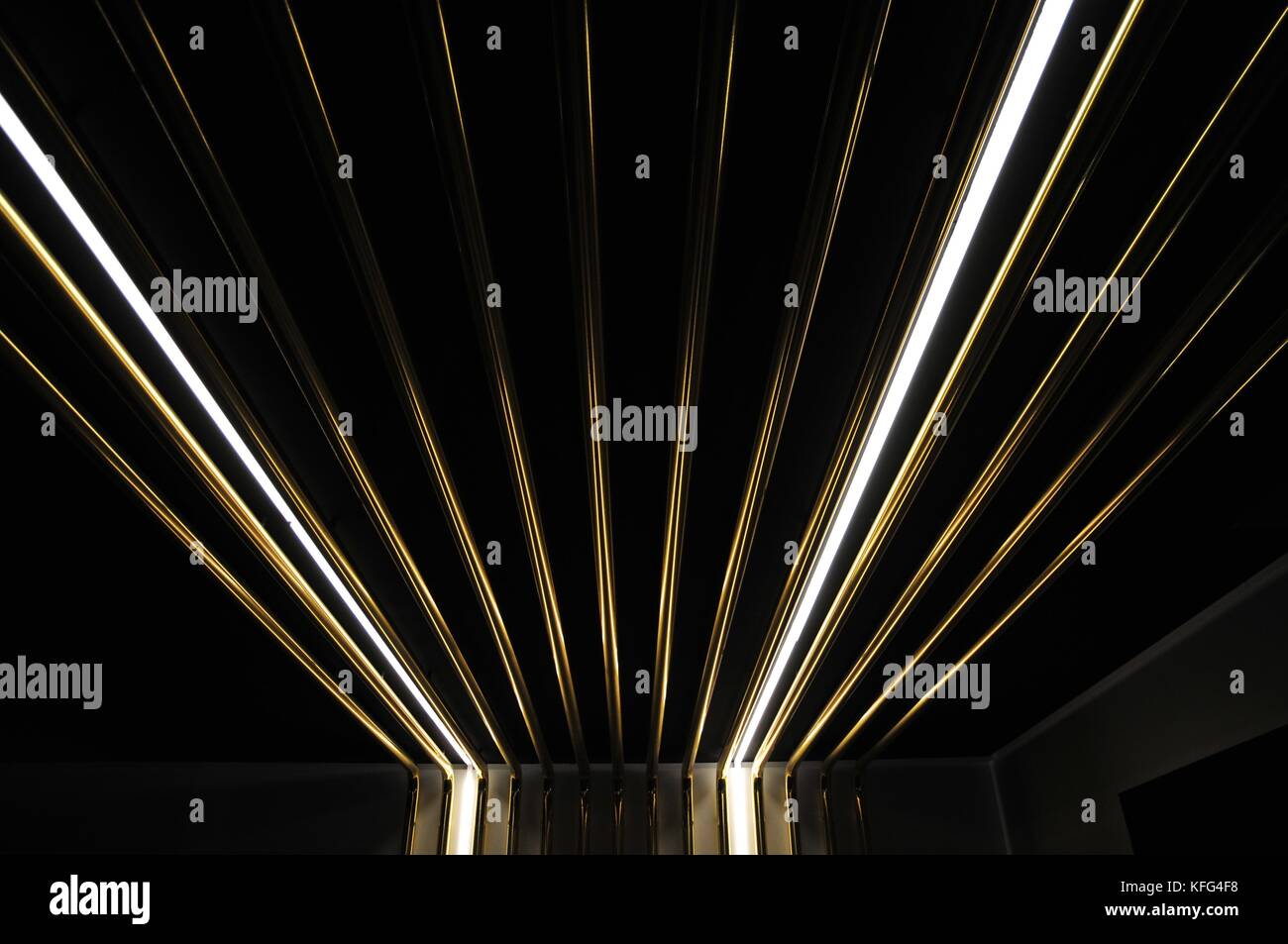 Golden pipes layout in indoor setting Stock Photo - Alamy