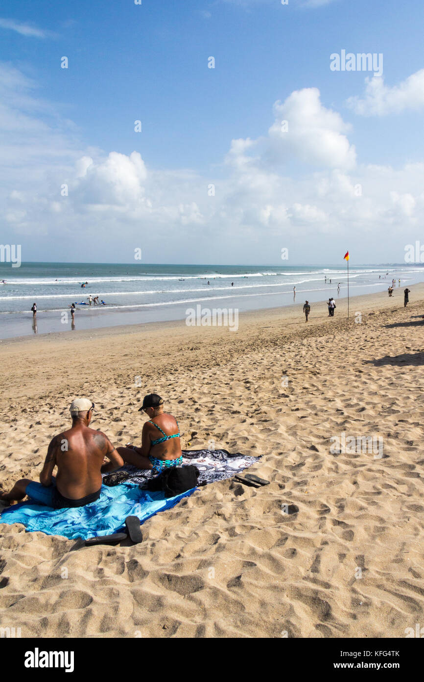 Sunbathers on Kuta beach, Bali, Indonesia Stock Photo - Alamy