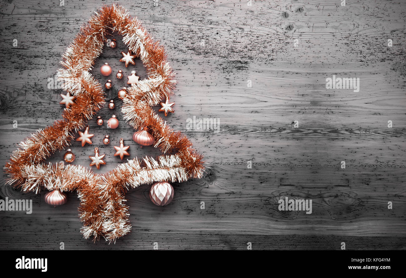 Orange Tinsel Christmas Tree.Christmas Ball Ornament On Gray Wooden ...