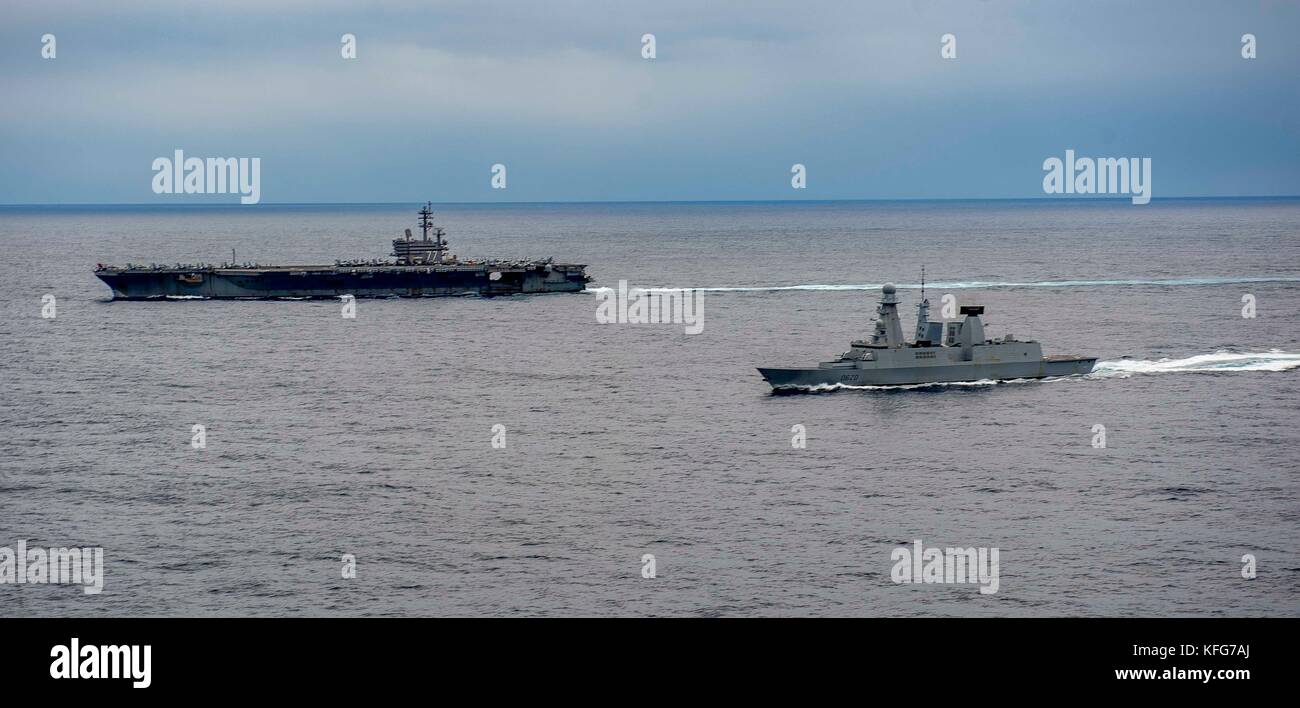 French frigate FS Forbin (D620) sails alongside the aircraft carrier USS George H.W. Bush (CVN ...