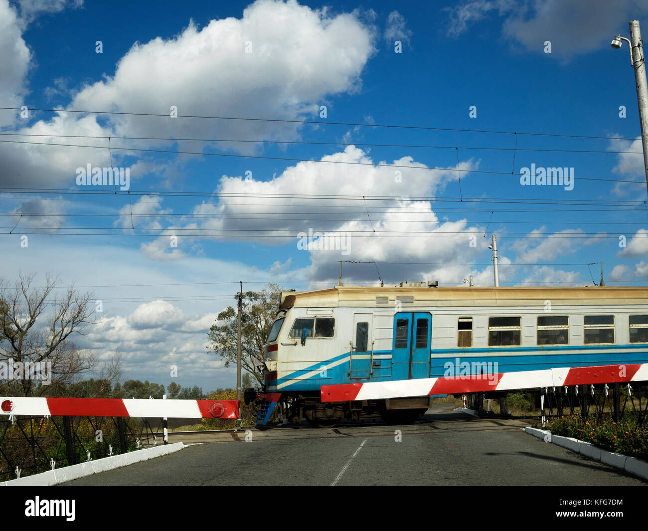closed railroad crossing with train Stock Photo - Alamy