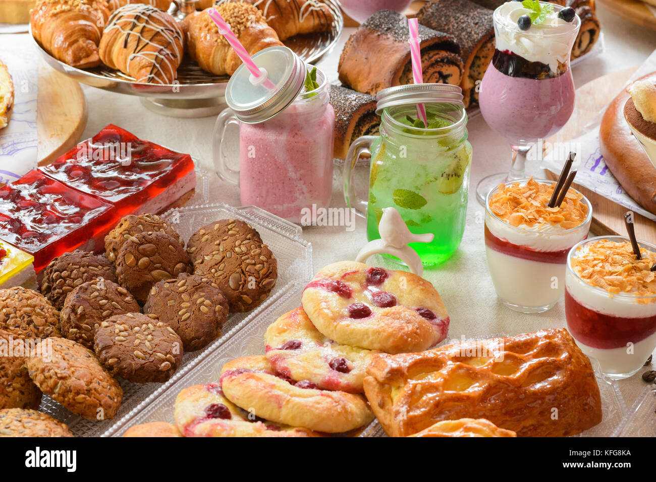 Table full of assorted confectionery sweets and desserts Stock Photo ...