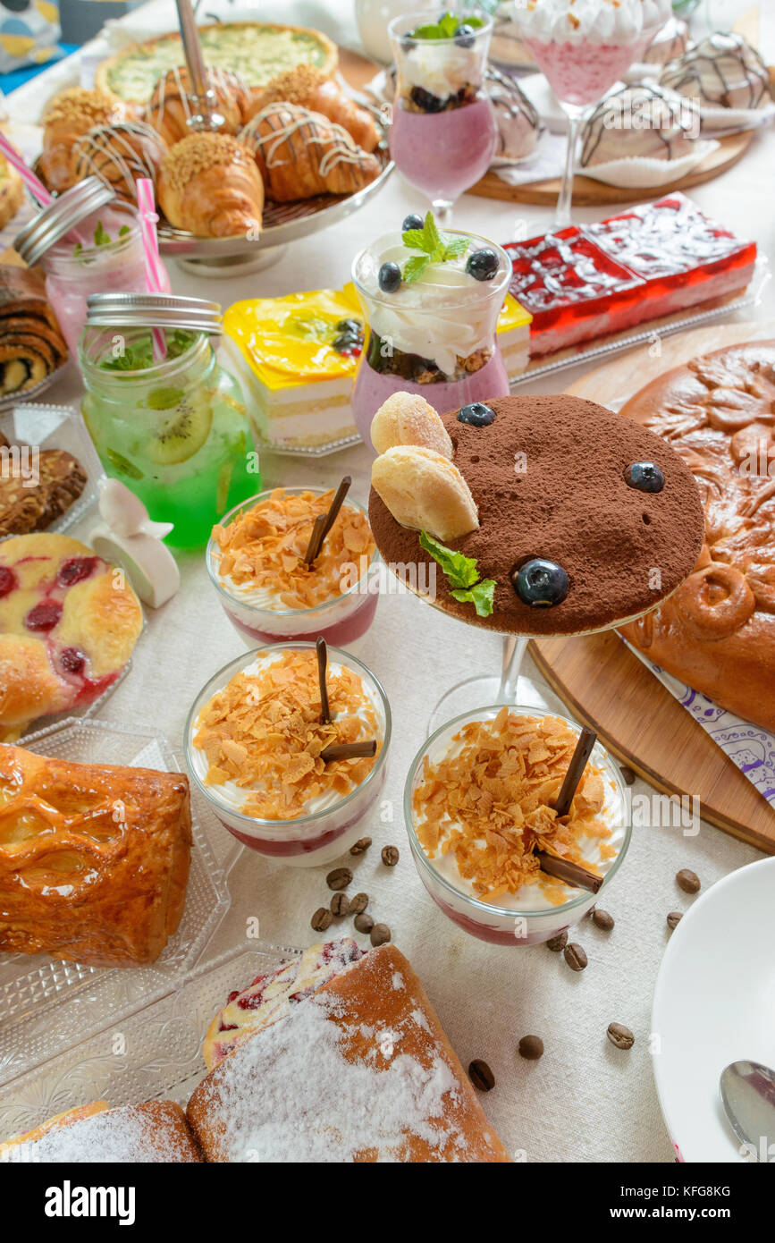 Table full of assorted confectionery sweets and desserts Stock Photo ...