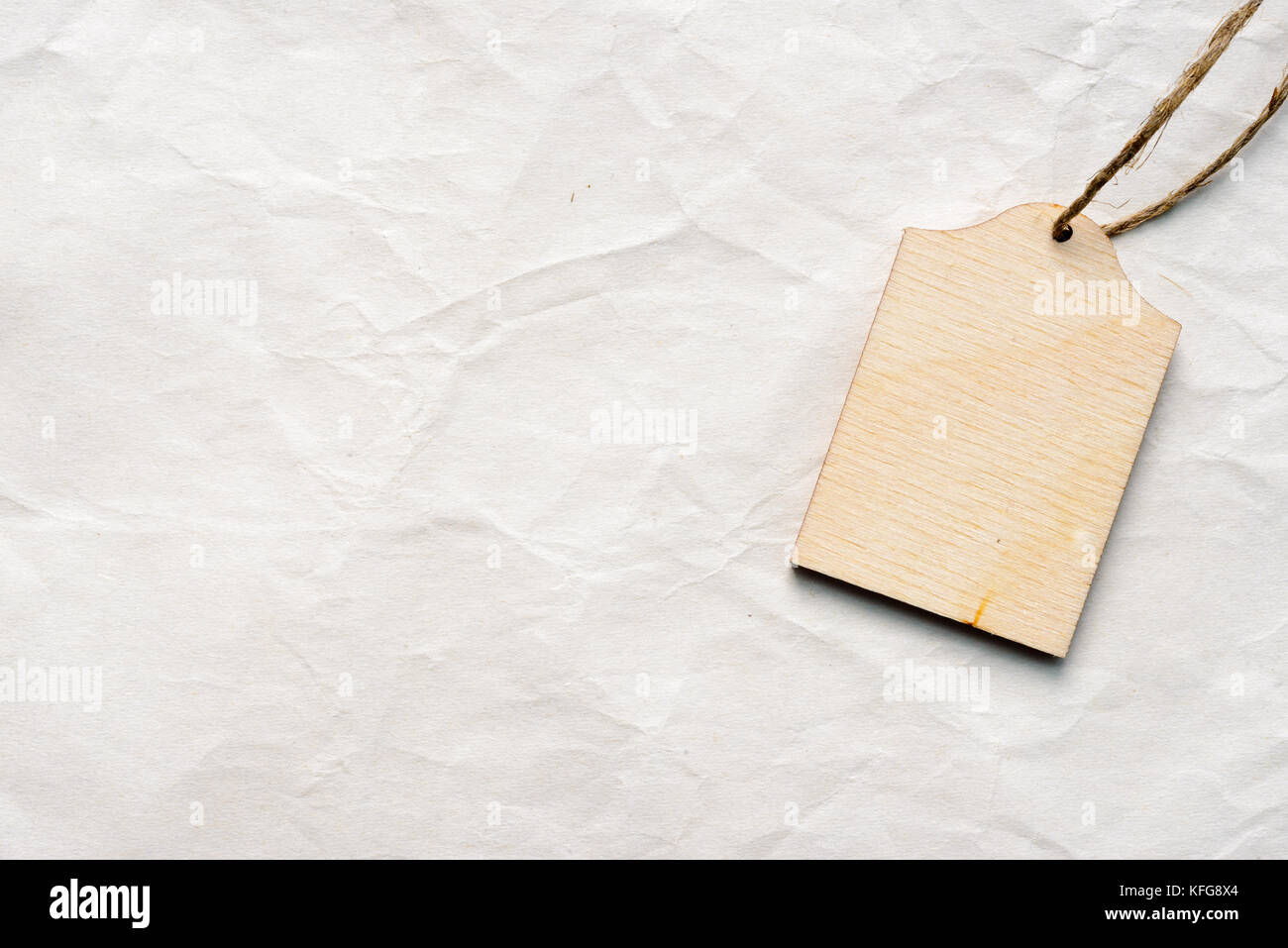 Handmade wooden label on textile background as greeting card Stock ...