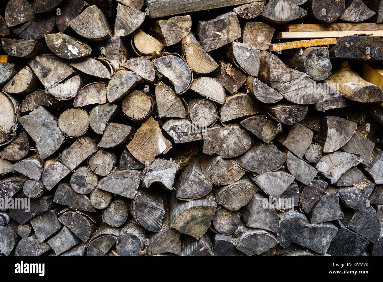 A pile of hard fire wood, weathered, background, graphical Stock Photo ...