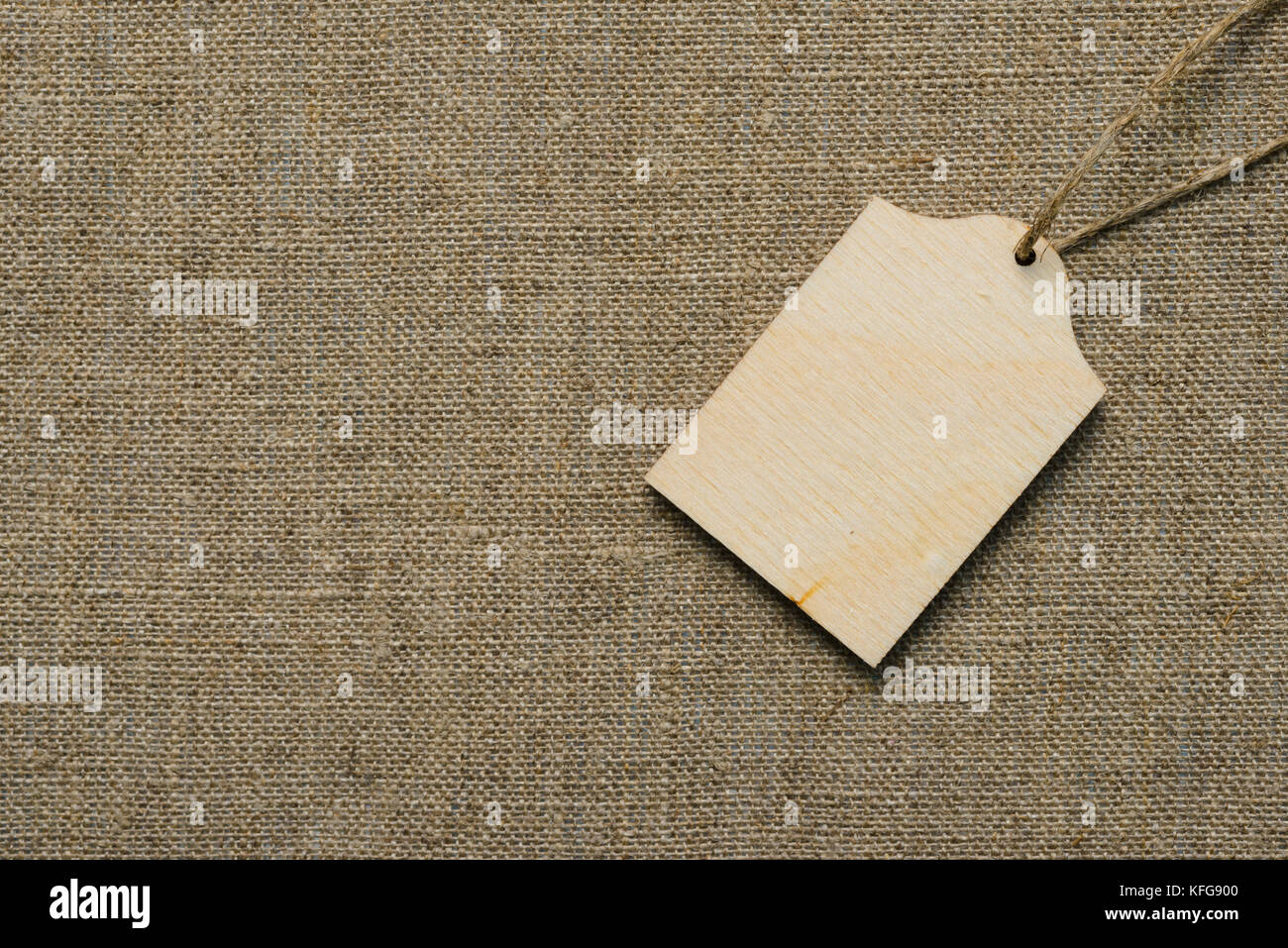 Handmade wooden label on textile background as greeting card Stock ...