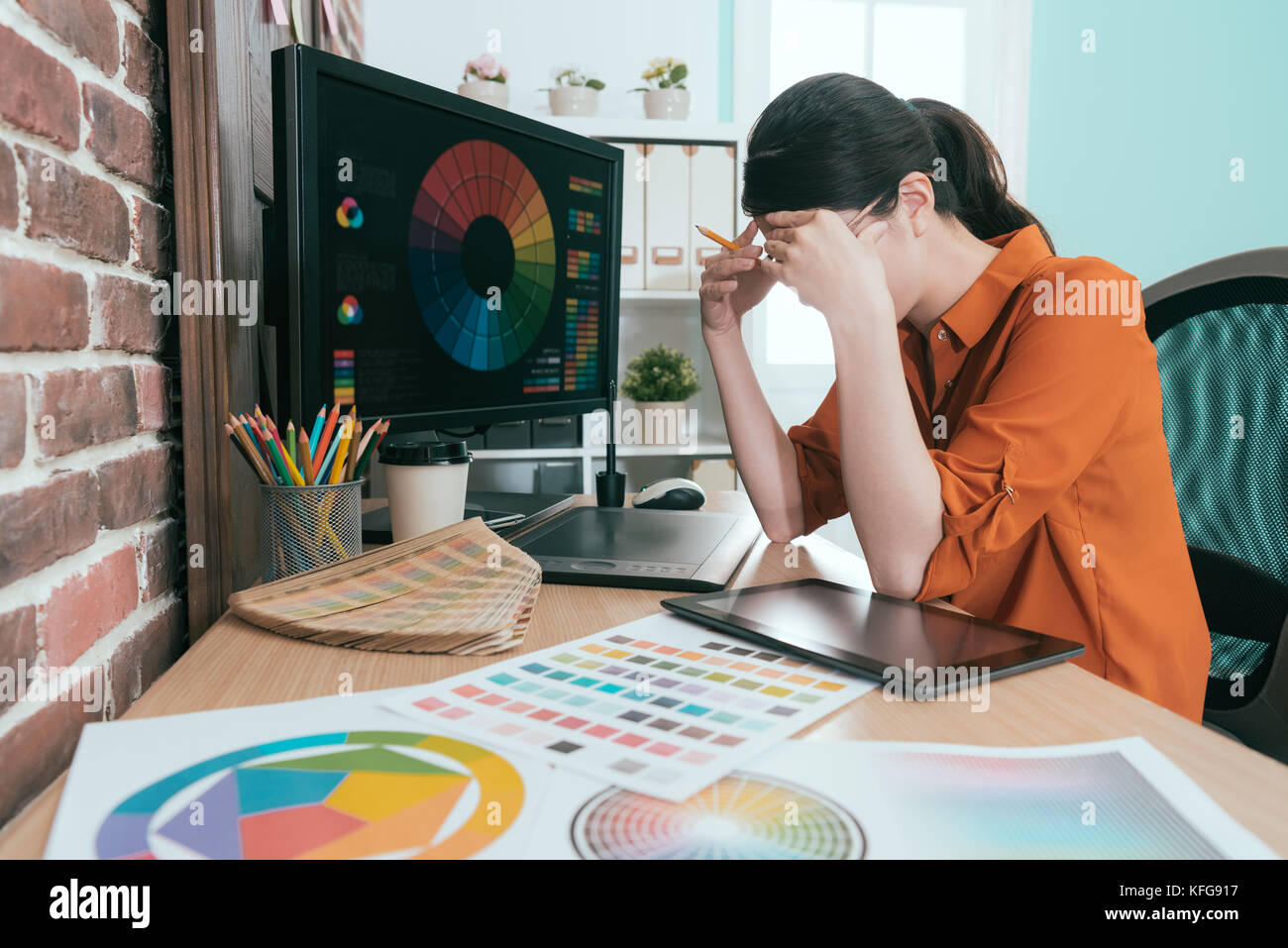 Asian graphic artist designing hi-res stock photography and images - Alamy