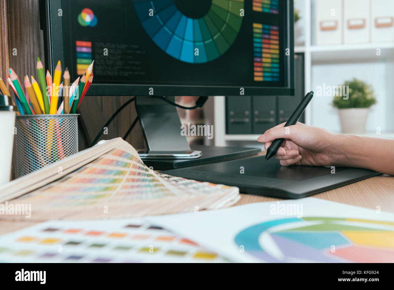 selective focus photo of graphic designer using digital pad pen work ...