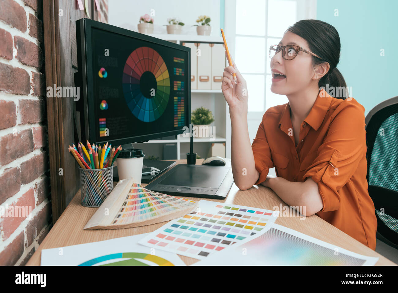 Female Graphic Designer At Work
