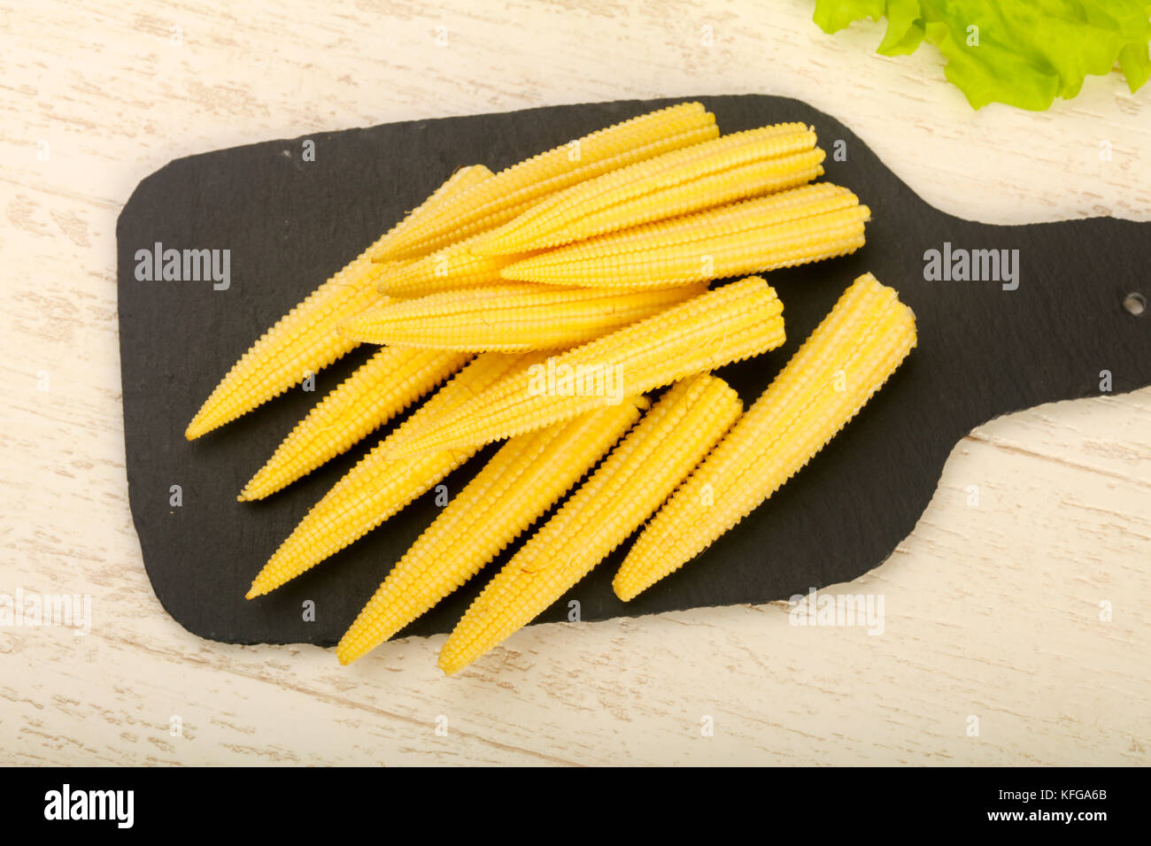 Young raw baby corn Stock Photo - Alamy