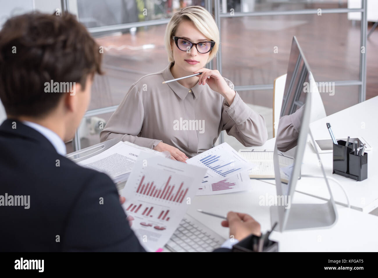 Marketing Analytics Meeting in Office Stock Photo - Alamy