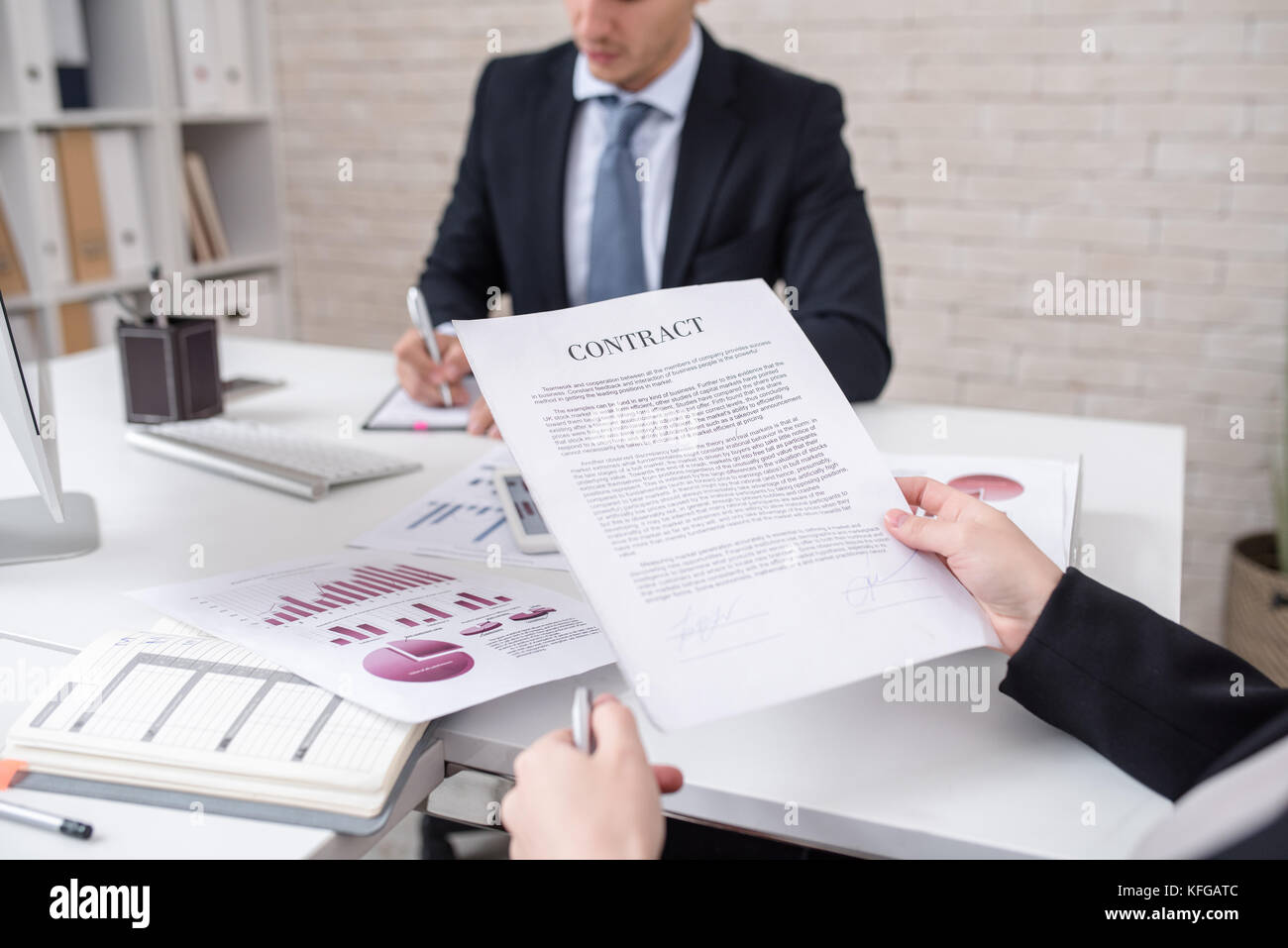 Business Person Reading Contract Stock Photo - Alamy
