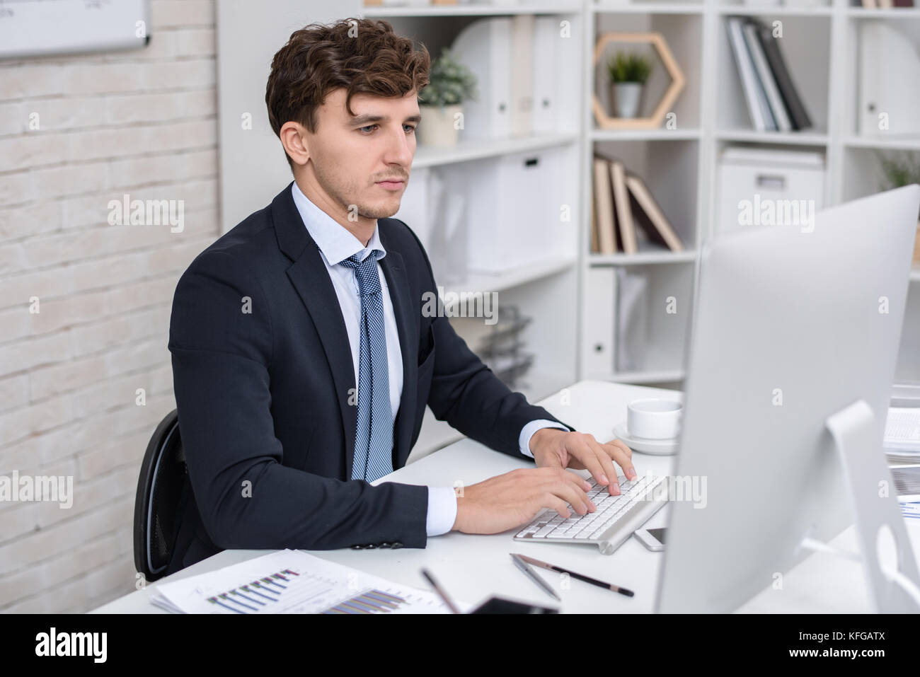 Businessman Using PC in Office Stock Photo - Alamy