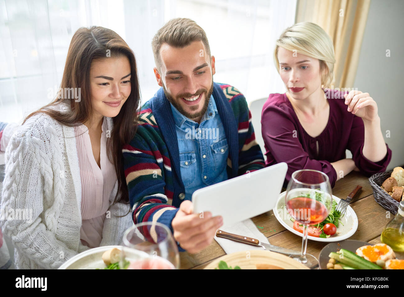 Couple enjoying meal at cafe hi-res stock photography and images - Alamy