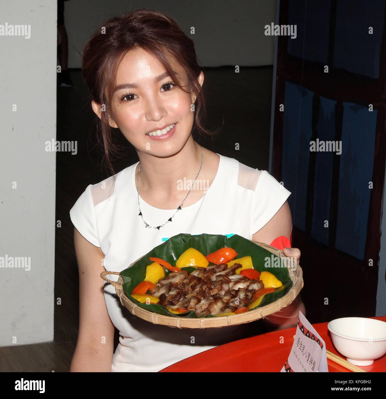 Yao Yao attends a charity event for the convenience store chain 7 ...