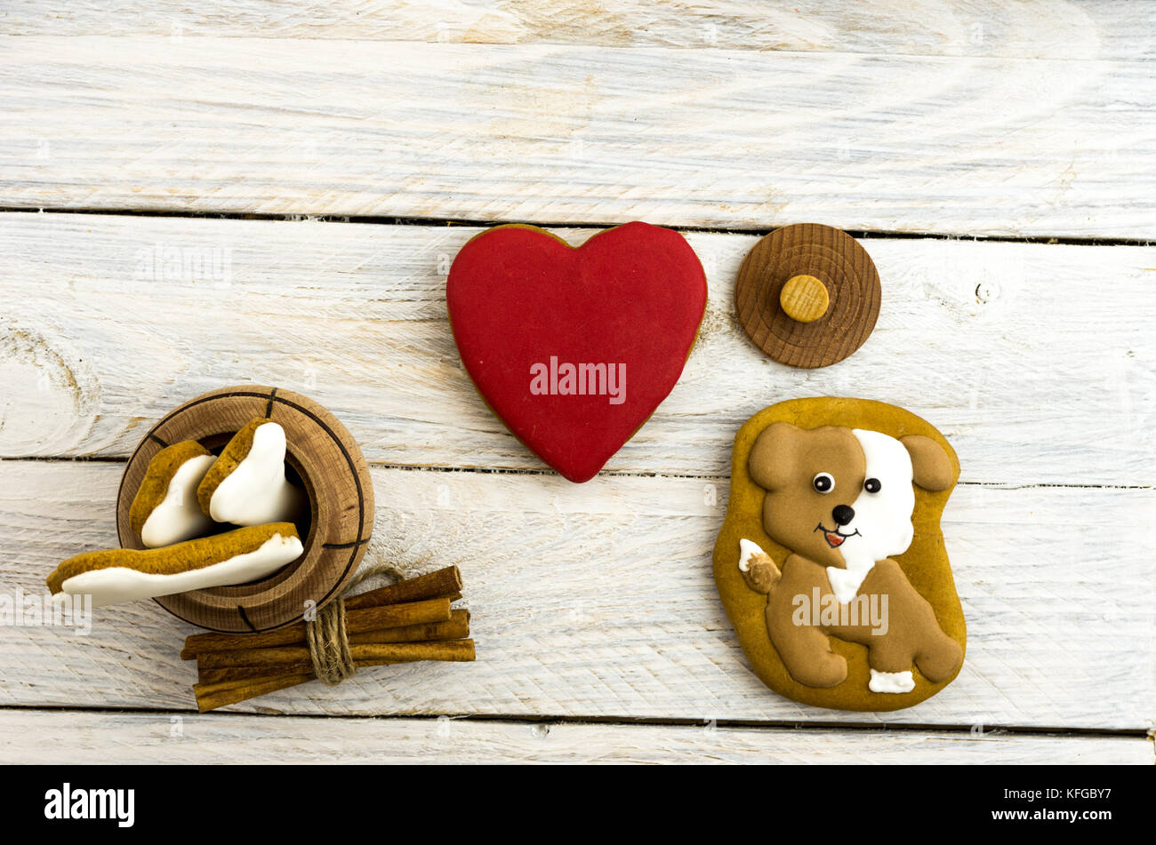 Festive decoration. Gingerbread in the shape of heart, dogs and bones ...