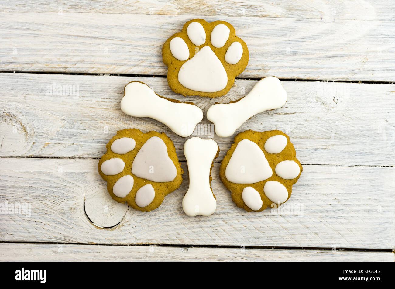 Cookies in the form of dog paws and bones. White background Stock Photo ...