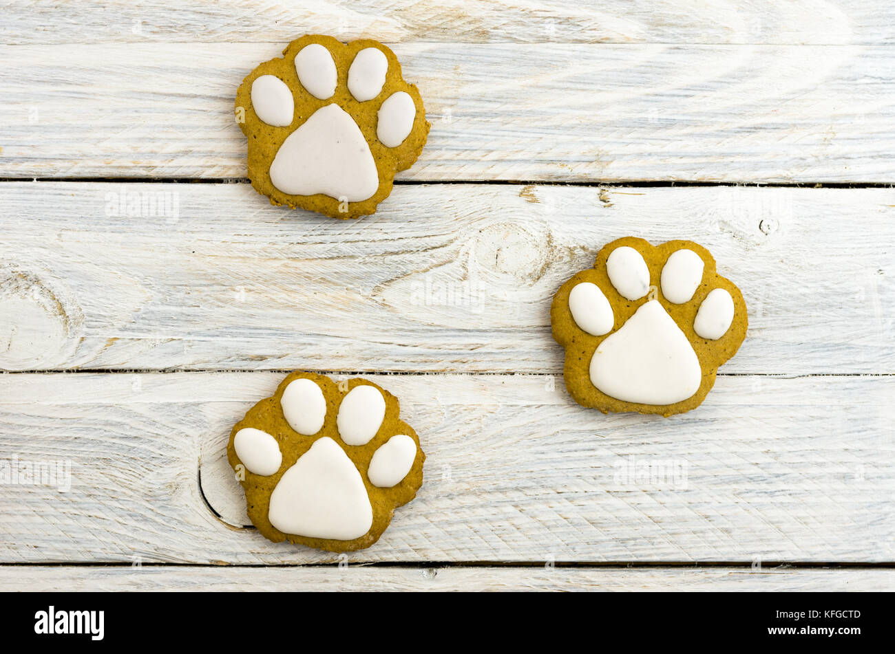 Footprints of dog paws. Sweet gingerbread on white background ...
