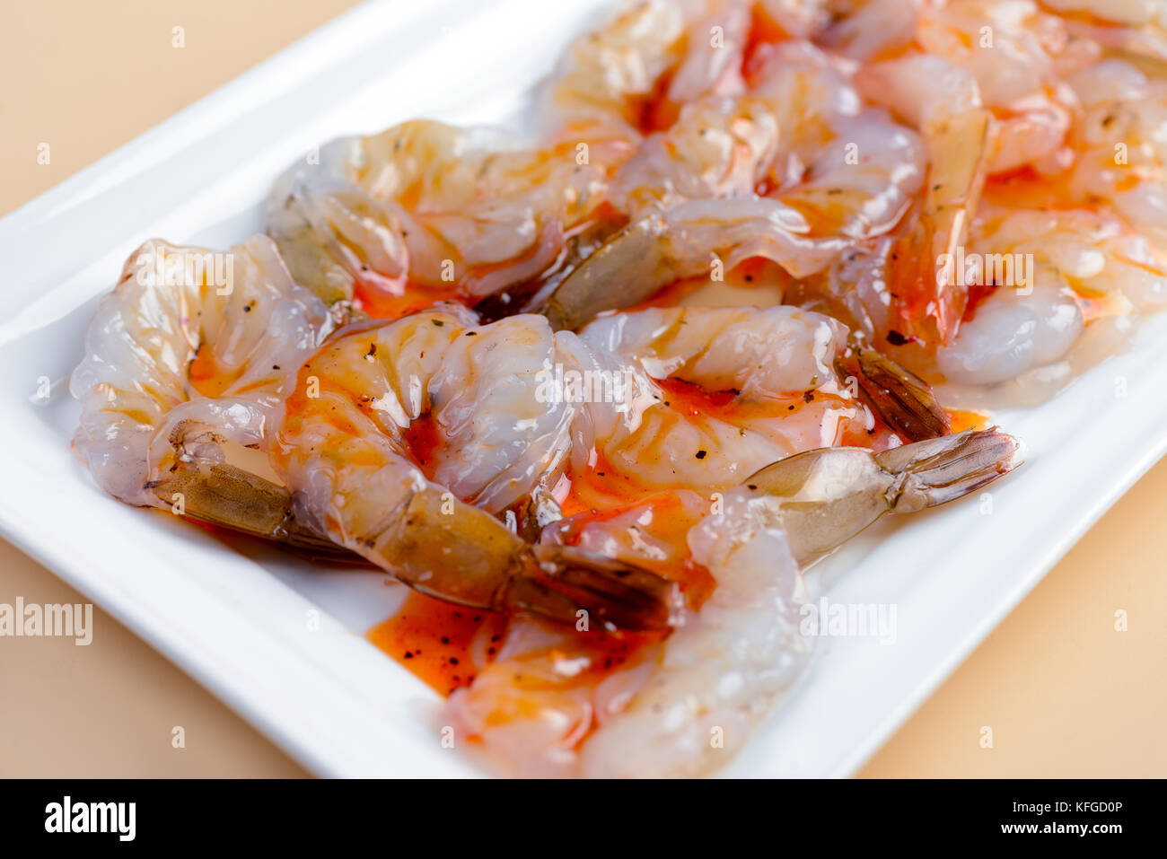 Fresh shrimp meat on white square dish Stock Photo - Alamy
