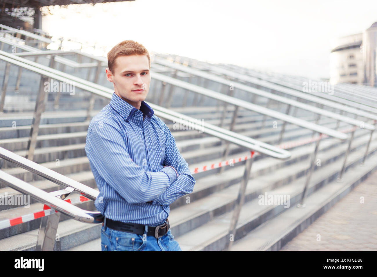 young handsome confident man stand at the stairs Stock Photo - Alamy
