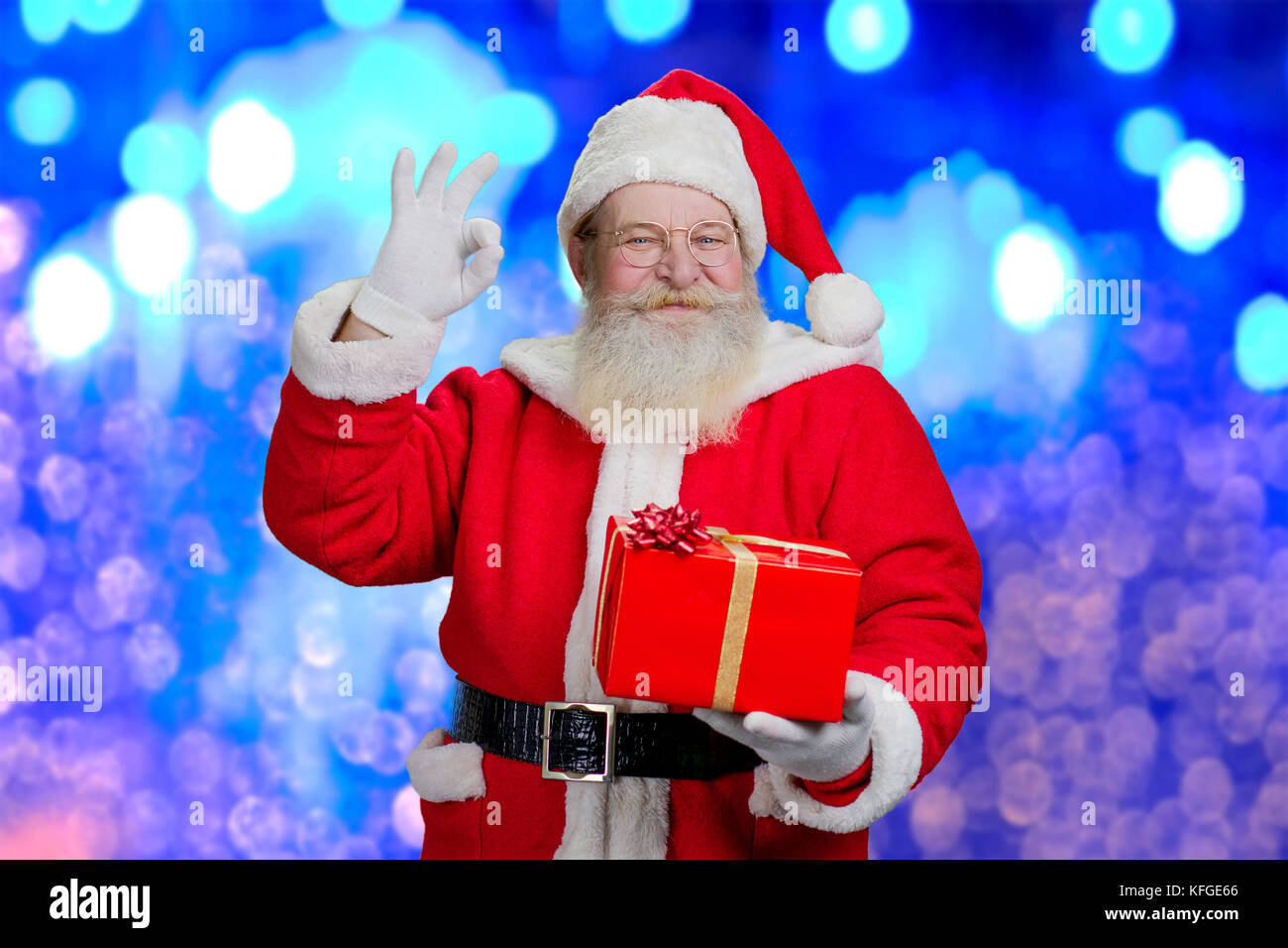 Happy Santa Claus with okey gesture. Portrait of cheerful Santa Claus ...
