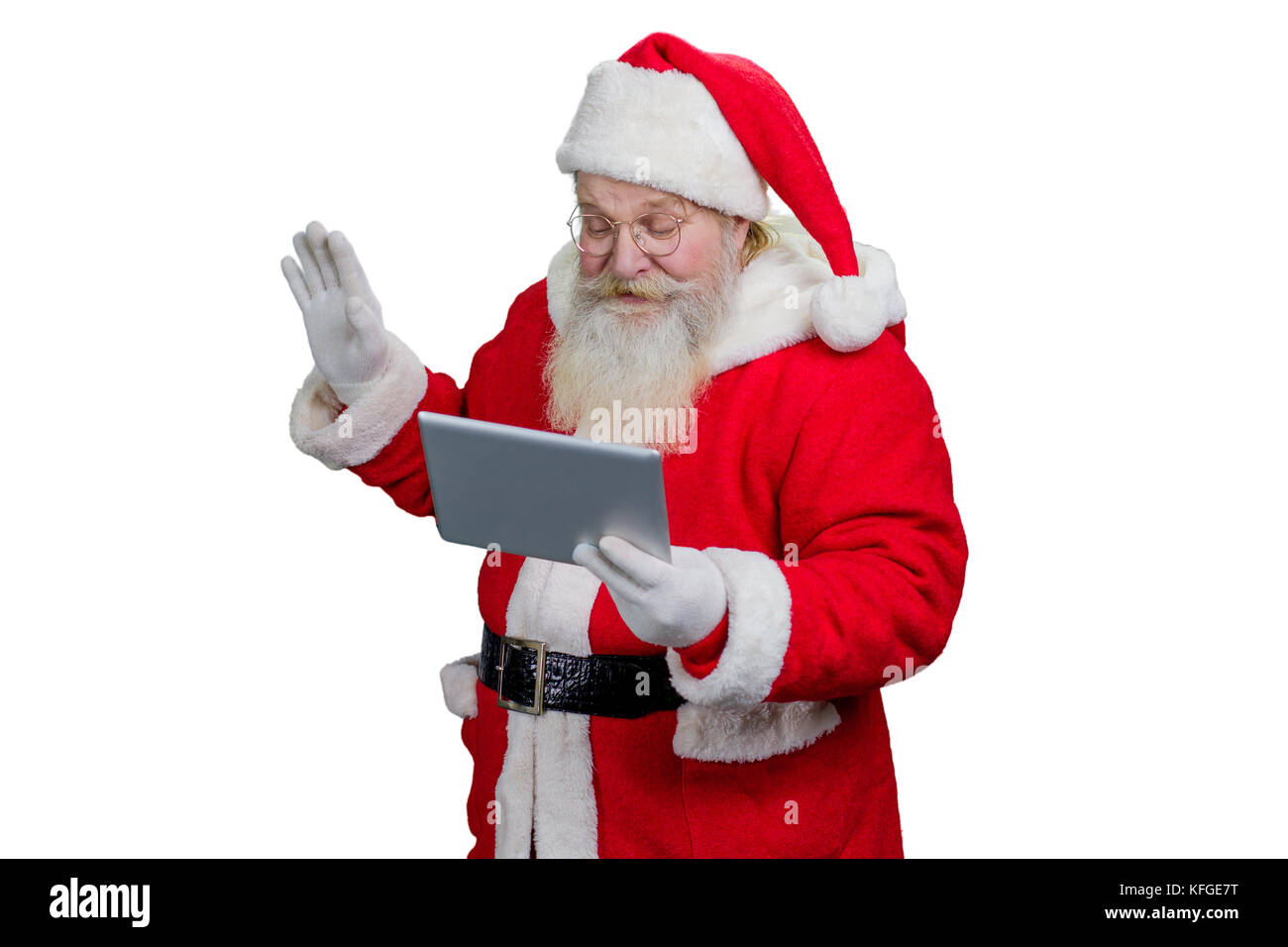Santa Claus with pc tablet. Santa Claus using computer tablet to communicate with children ...