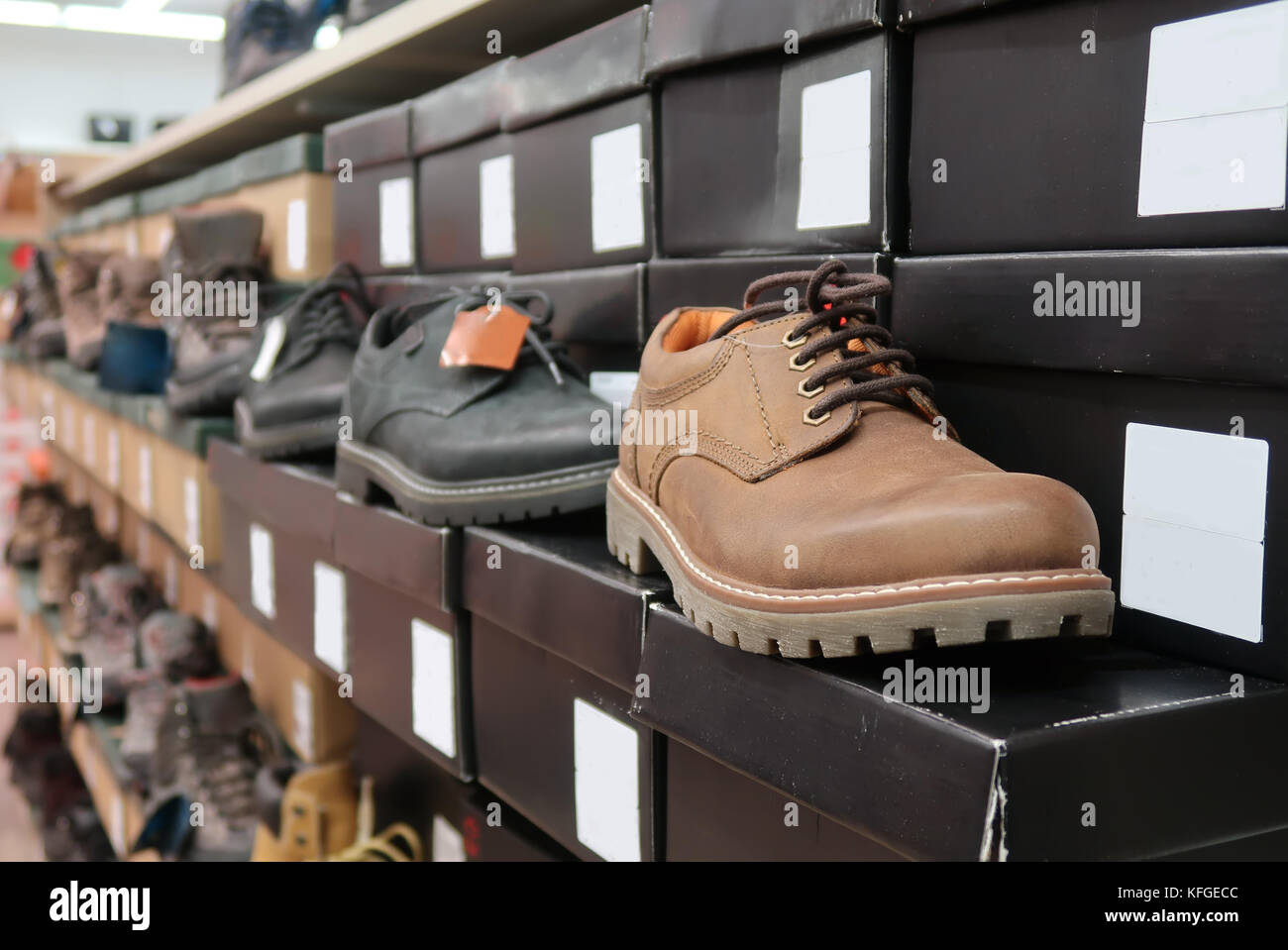 Men shoes in a store Stock Photo - Alamy