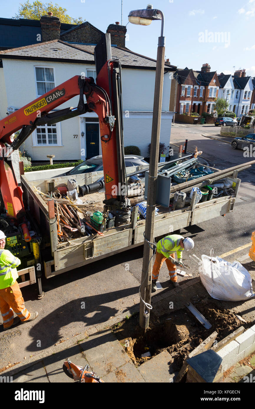 Removal of old sodium lamp / street lamppost. The concrete post is at ...