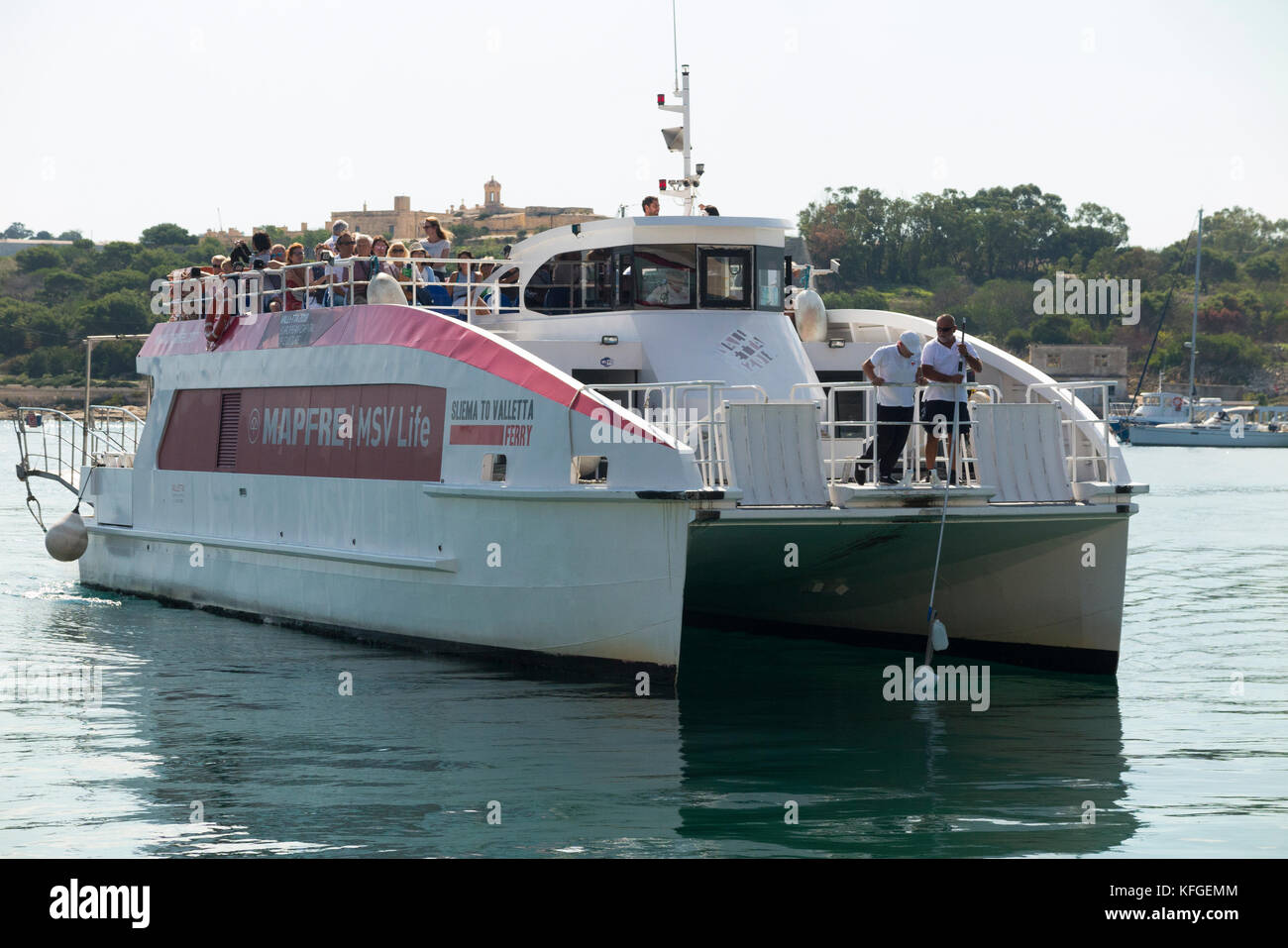 The Valletta / Sliema passenger Ferry ' Top Cat One ' with the Valletta ...
