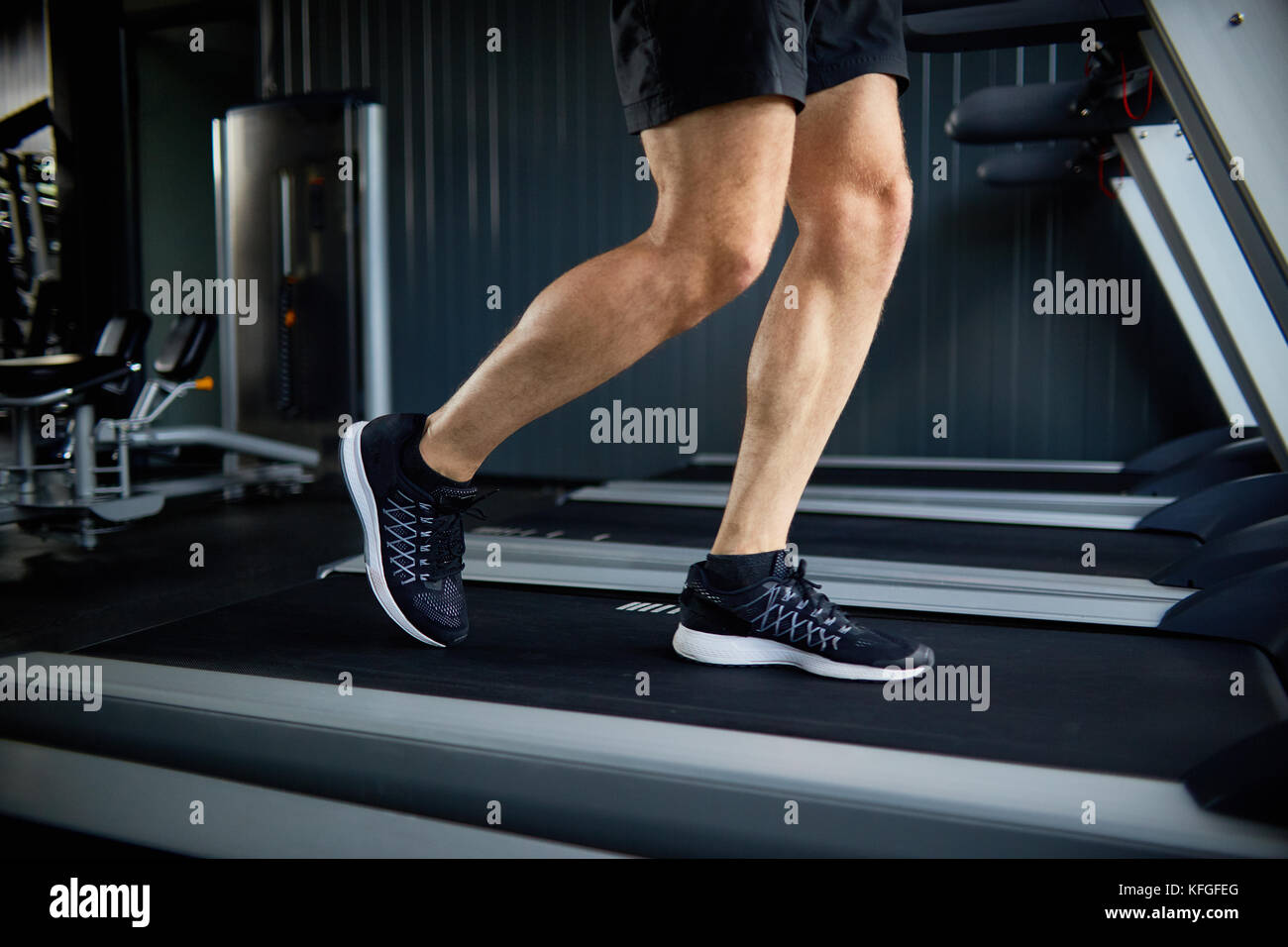 Muscular Legs Running on Treadmill Stock Photo - Alamy Muscular Legs Running on Treadmill Stock Photo - Alamy
