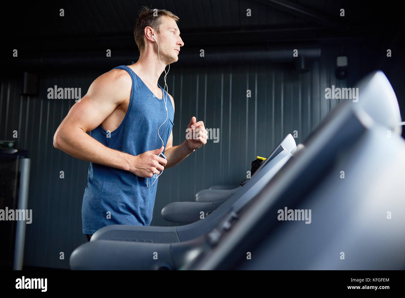 Runner Training in Gym Stock Photo - Alamy