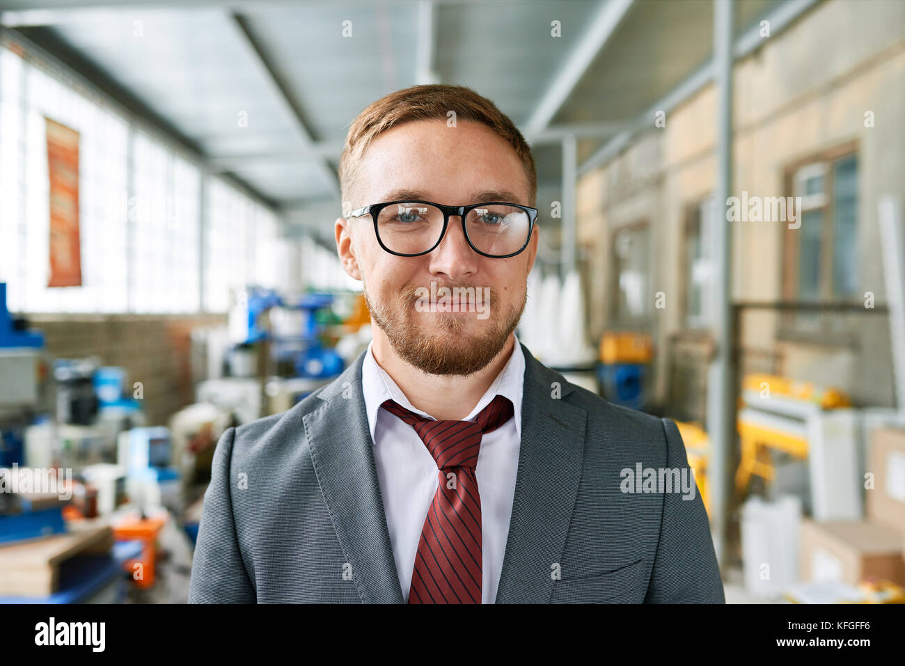 Cheerful Shop Assistant in Units Showroom Stock Photo - Alamy