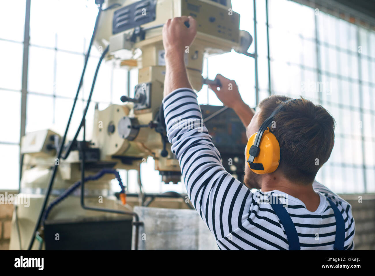 Worker Operating Machine Units Stock Photo - Alamy