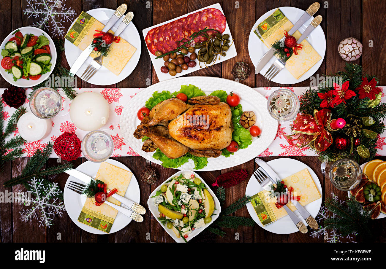 Baked turkey or chicken. The Christmas table is served with a turkey ...