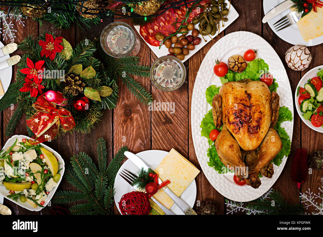 Baked turkey or chicken. The Christmas table is served with a turkey ...