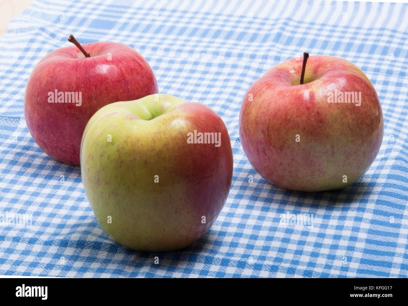 Three ripe apples Stock Photo - Alamy