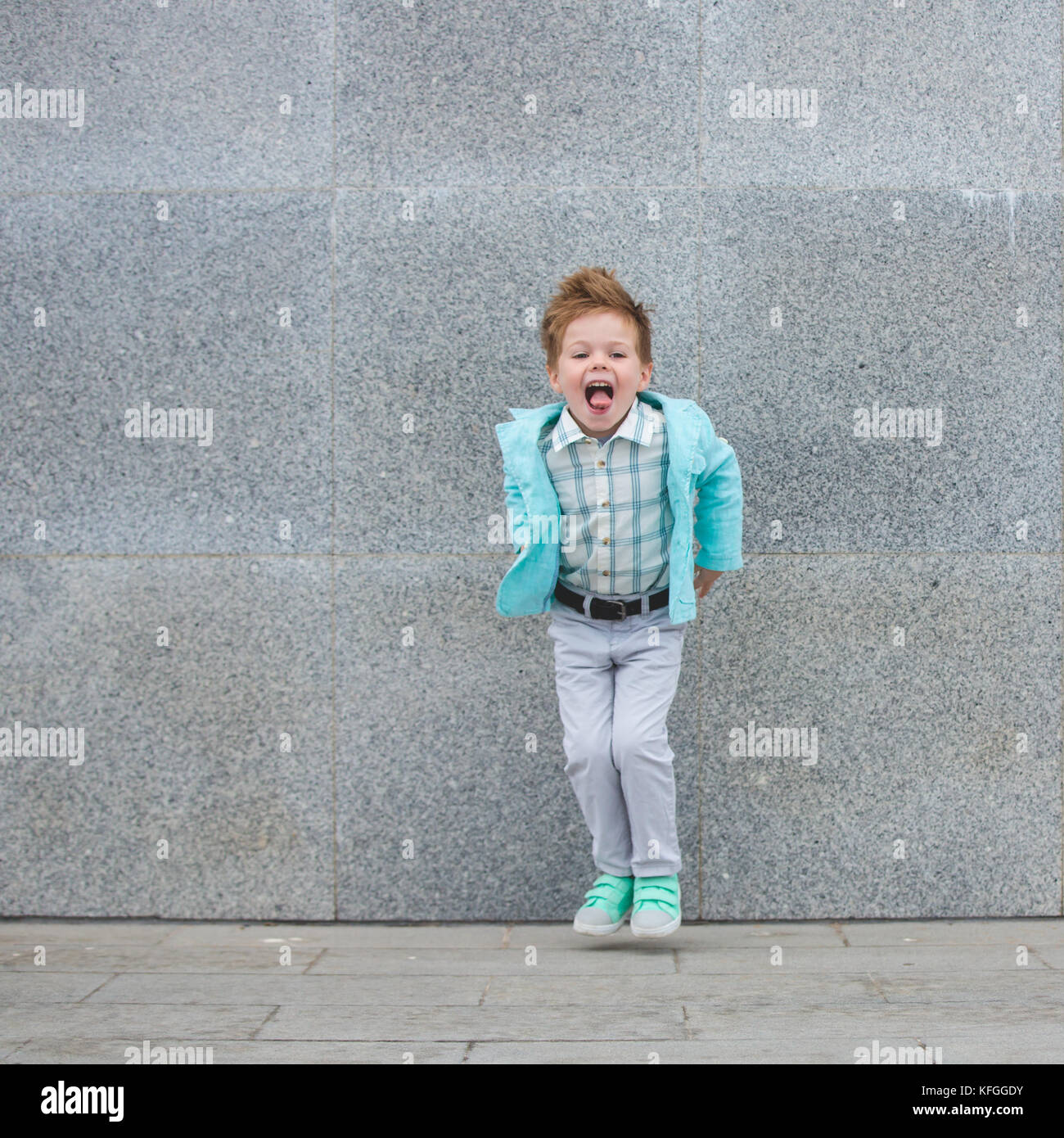 Kid posing hi-res stock photography and images - Alamy