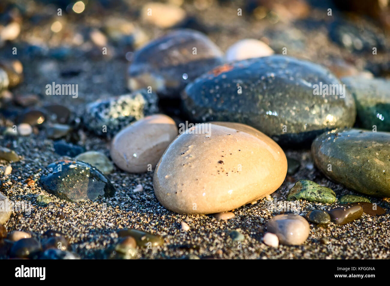 At the beach near the water are marine pebbles. Reference picture Stock ...