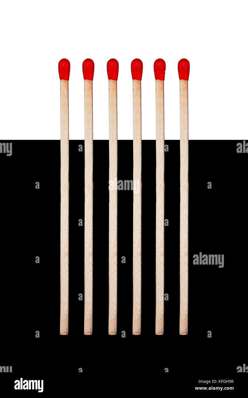 Six matches against black and white background Stock Photo - Alamy