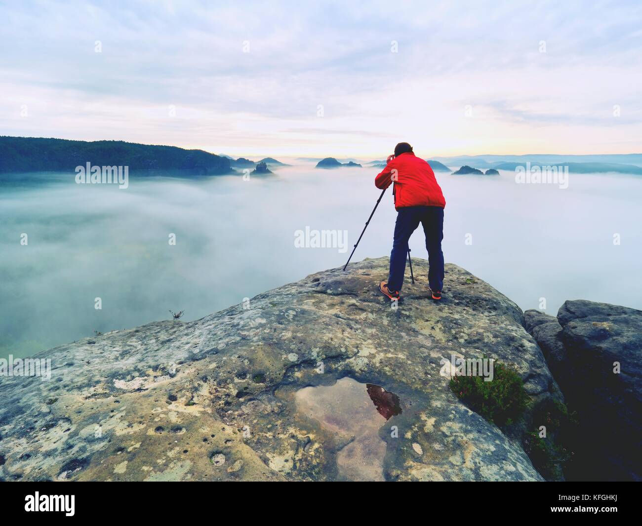 Photographer framing picture with eye on viewfinder. Photo enthusiast ...