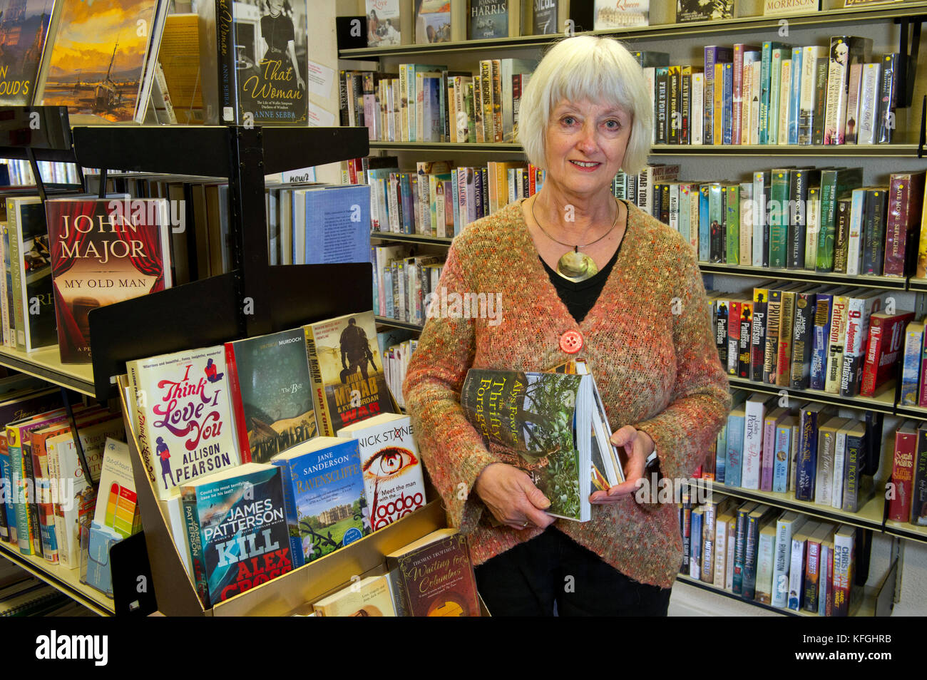 Mary Cook volunteering in Ramsbury Library Stock Photo - Alamy