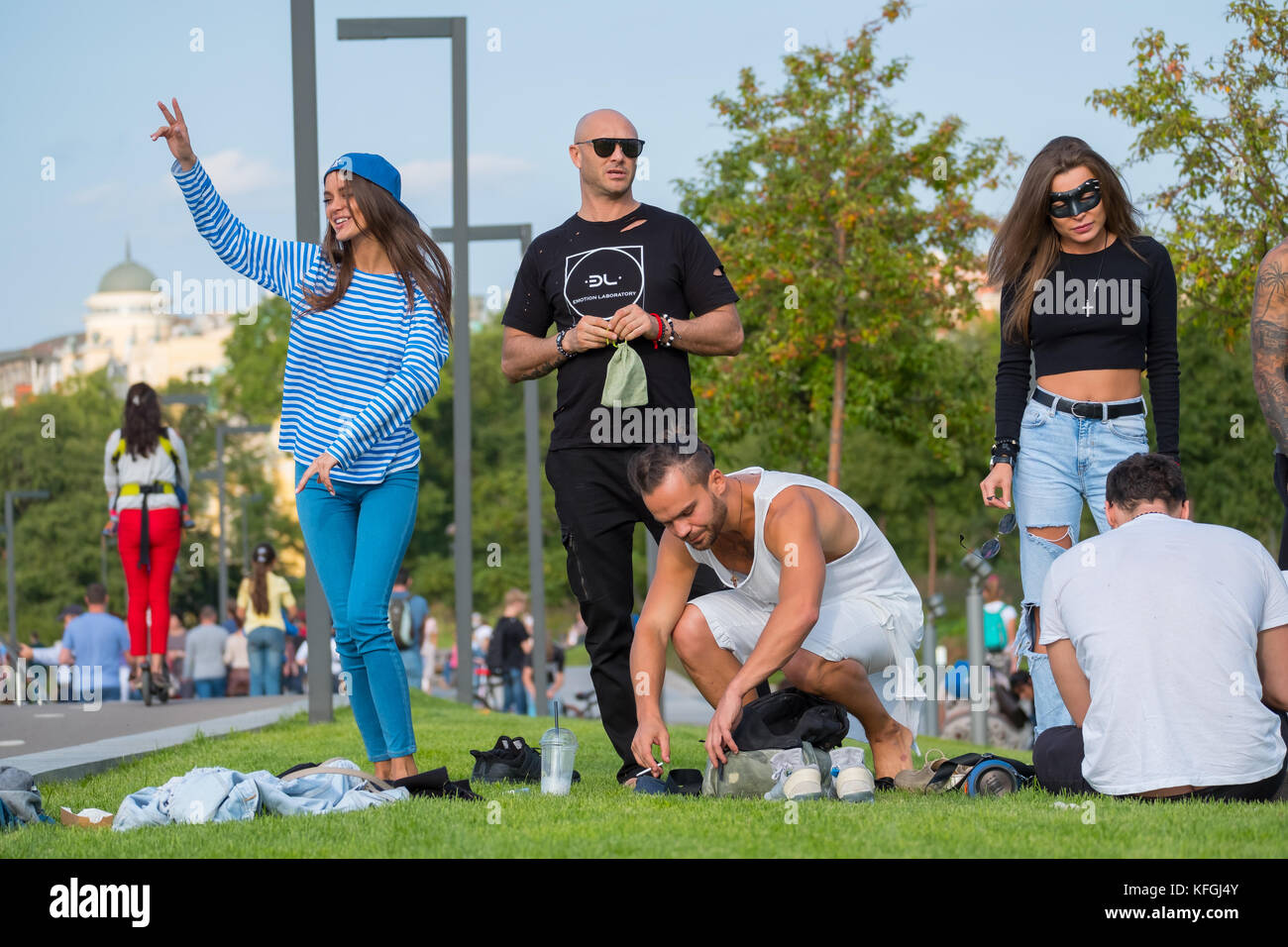 Group of young people having fun in the park at day time Stock Photo ...