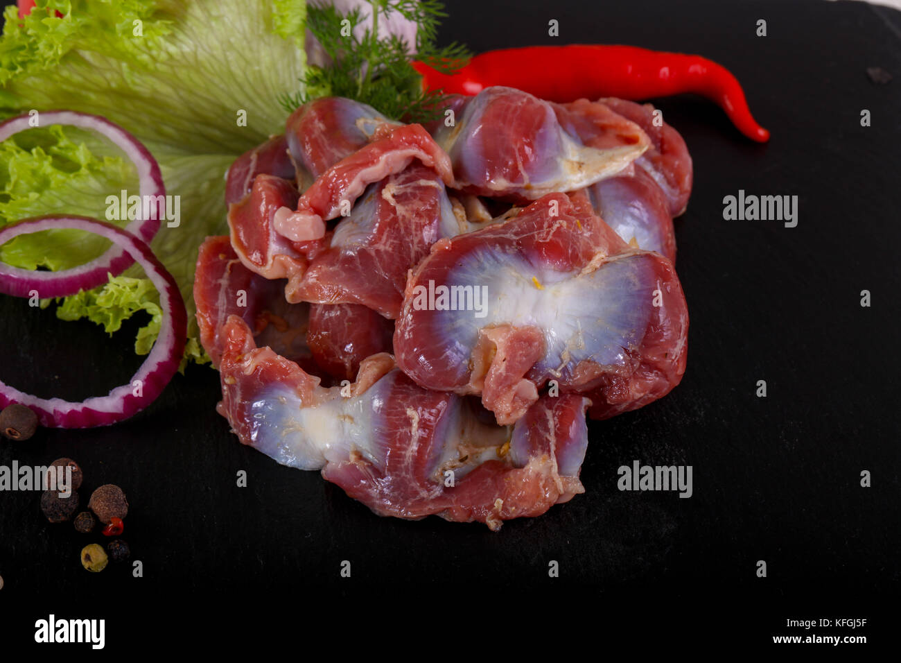 Raw chicken stomach for cooking Stock Photo - Alamy