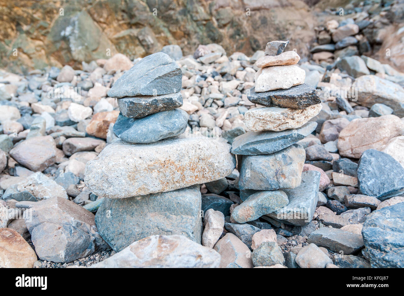 pile of stones forming a sign Stock Photo - Alamy