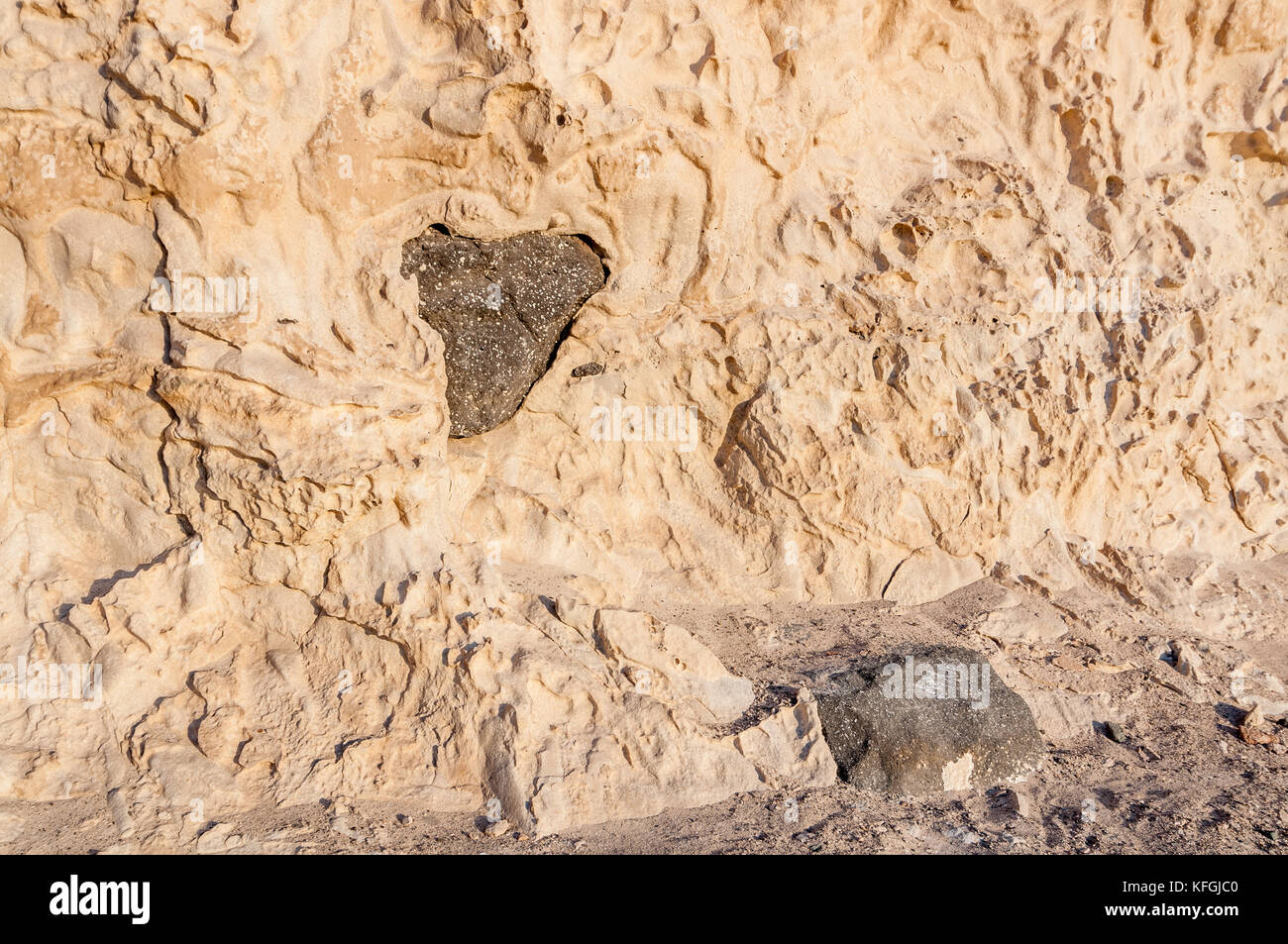 basalt pyroclate in an ancient beach forming a rock. Ajuy ...