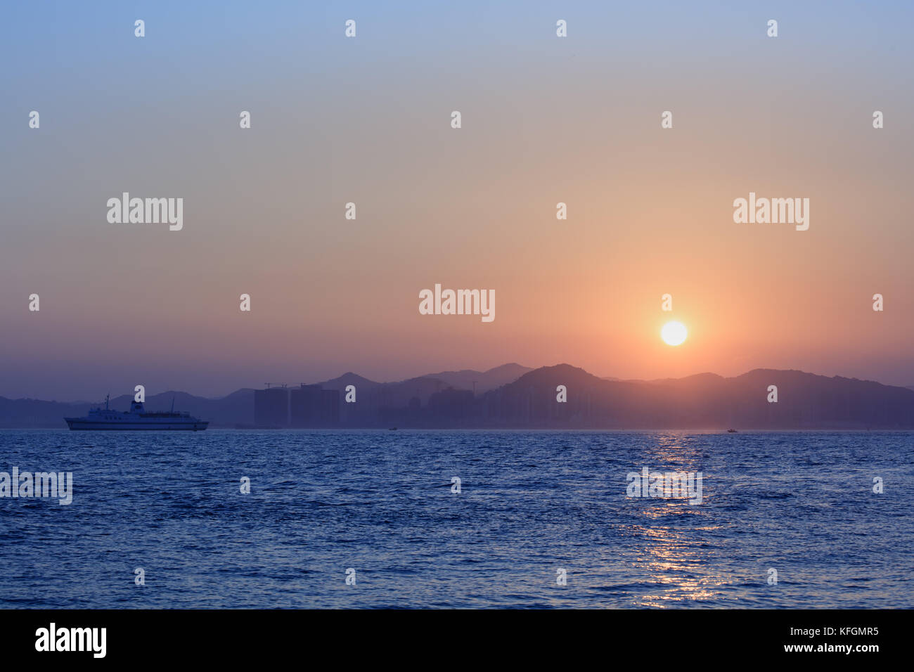 Sunset with sea and mountains in xiamen, China Stock Photo - Alamy