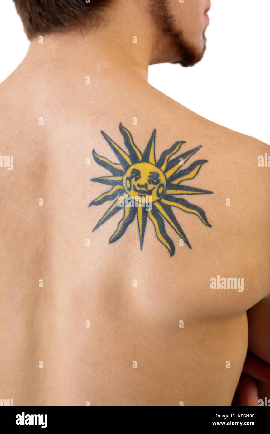 Young man with a stylized sun on his back Stock Photo - Alamy