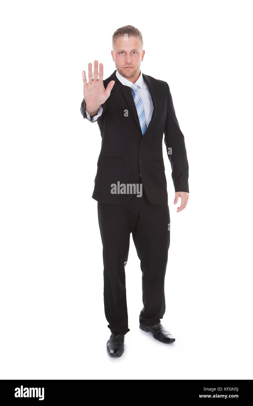 Businessman with stop hand up hi-res stock photography and images - Alamy
